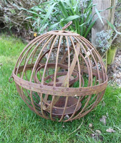 Lot 1020 - A hanging iron cage with gimbal bracket