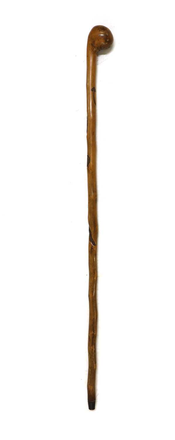 Lot 186 - A Japanese hardwood walking stick