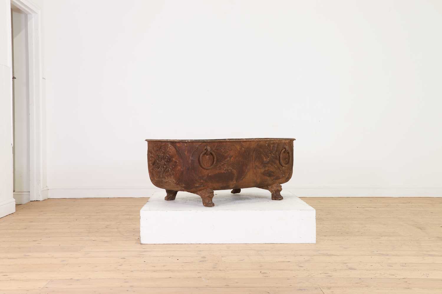 Lot 672 - A cast iron water trough,