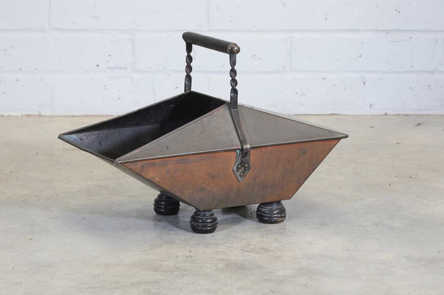 Lot 18 - A copper-finished coal scuttle,
