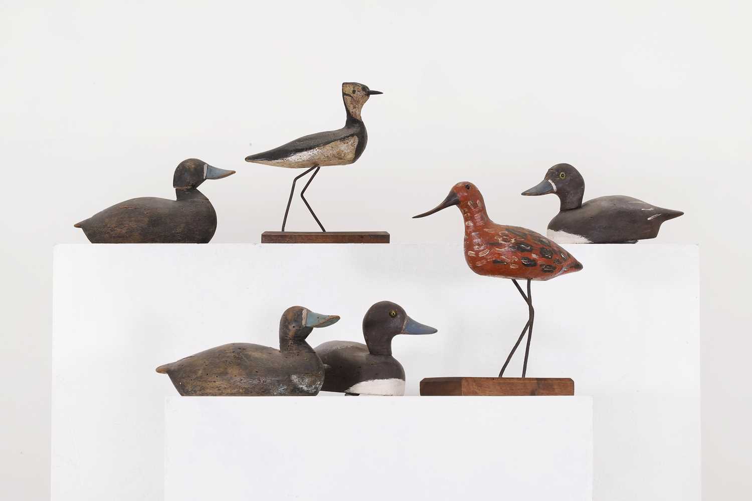 Lot 361 - A group of carved and painted decoy birds,