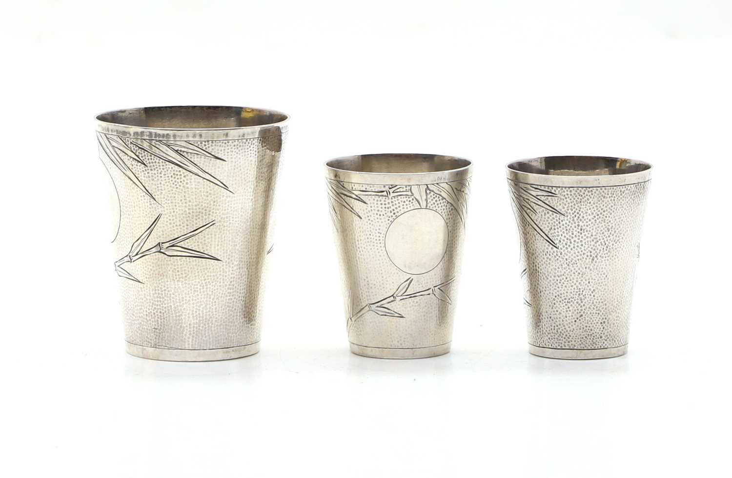 Lot 6 - A set of three silver cocktail spirit measures,